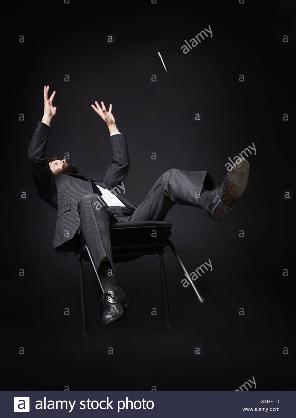 Falling Off Chair High Resolution Stock Photography and Images - Alamy