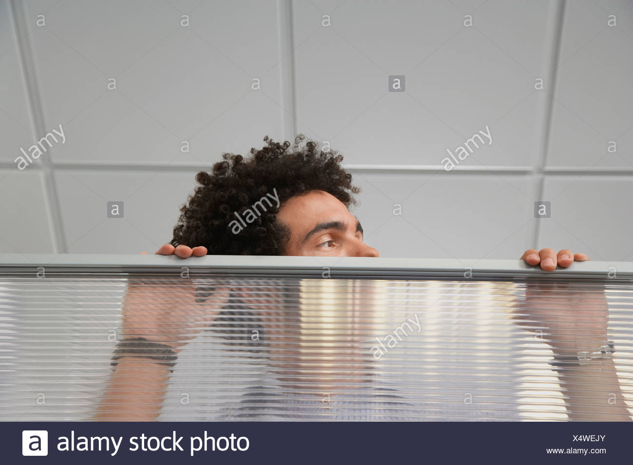 Man Peeking Over Wall Stock Photos & Man Peeking Over Wall Stock Images ...