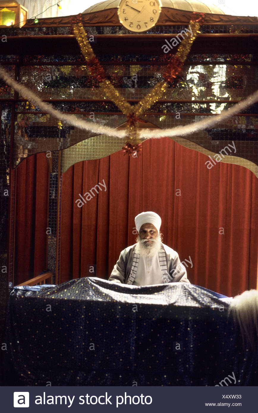 Sikh Reading Holy Scriptures High Resolution Stock Photography and ...