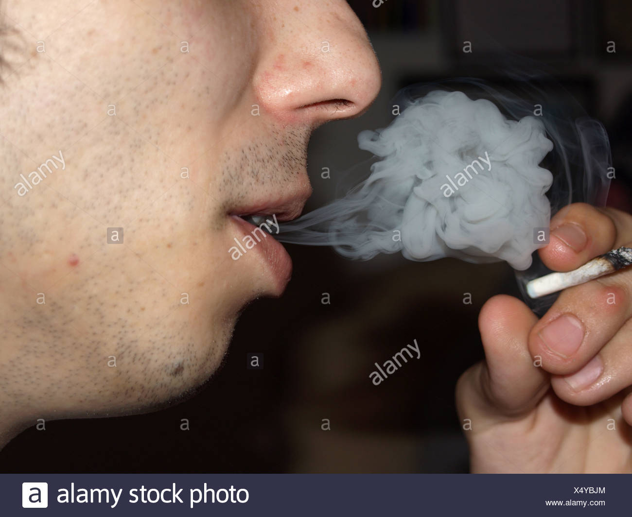 Smoke Mouth High Resolution Stock Photography and Images - Alamy