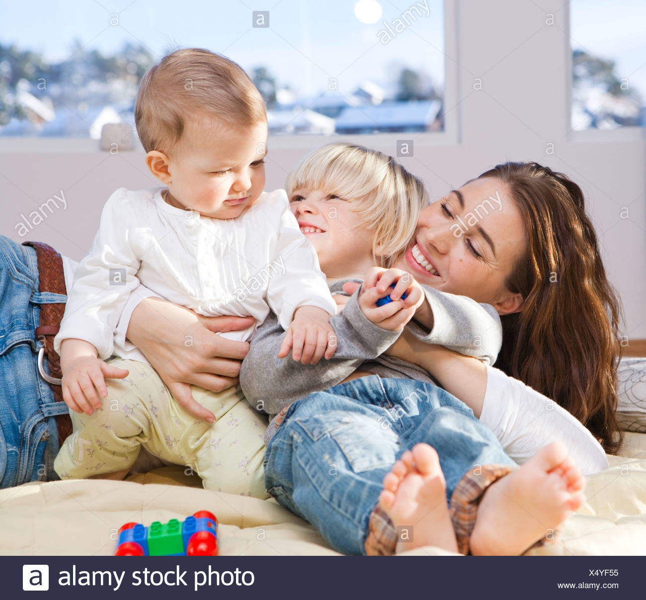 Cuddling Children High Resolution Stock Photography and Images - Alamy
