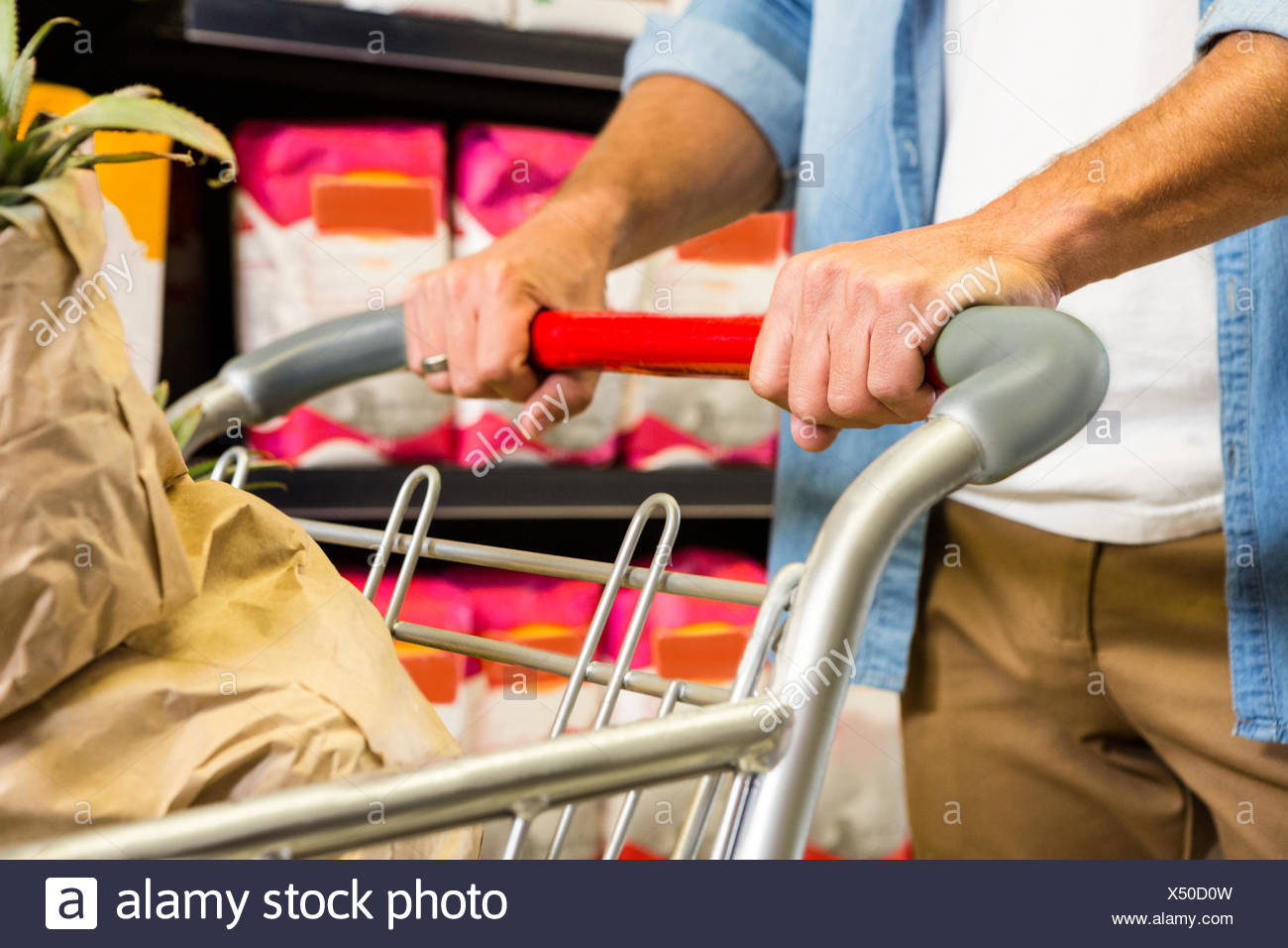Man Pushing Trolley High Resolution Stock Photography and Images - Alamy