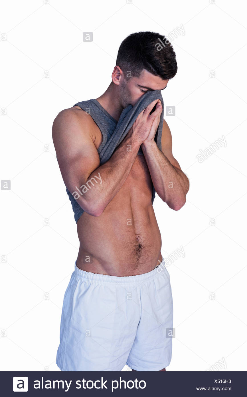 Man Wiping Face Shirt High Resolution Stock Photography and Images - Alamy