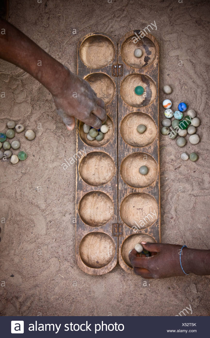 Two Children Playing Marbles Stock Photos & Two Children Playing ...
