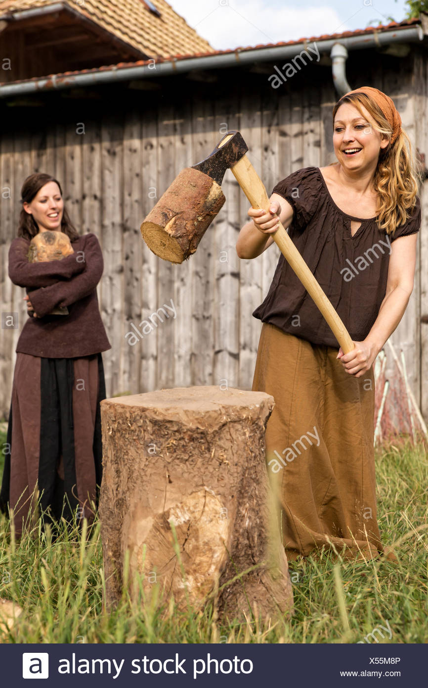 Woman Chopping Wood Axe High Resolution Stock Photography and Images ...