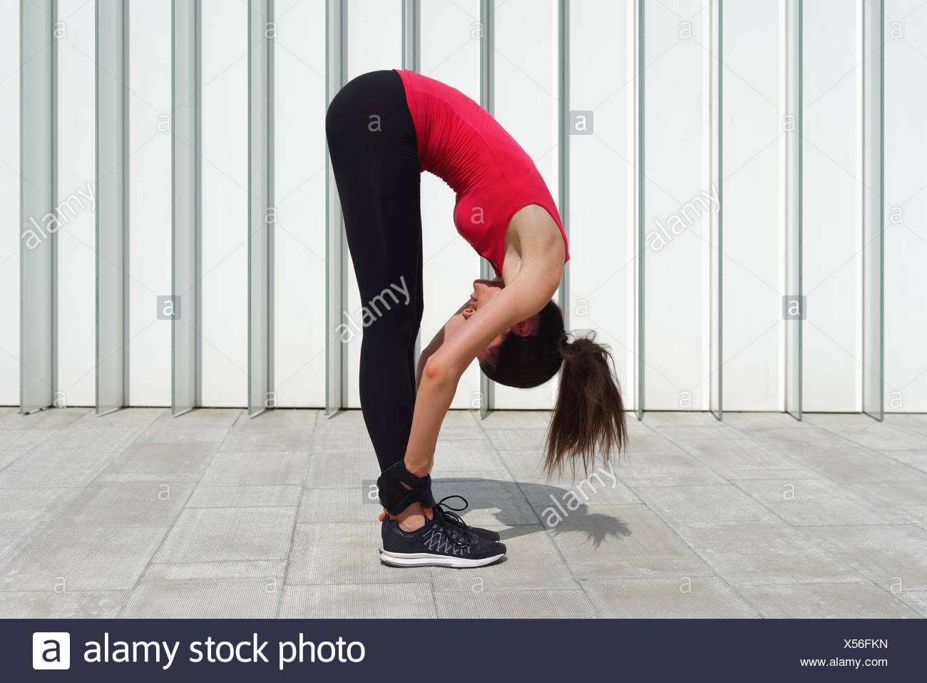 Woman Bending Over Touching Toes High Resolution Stock Photography And