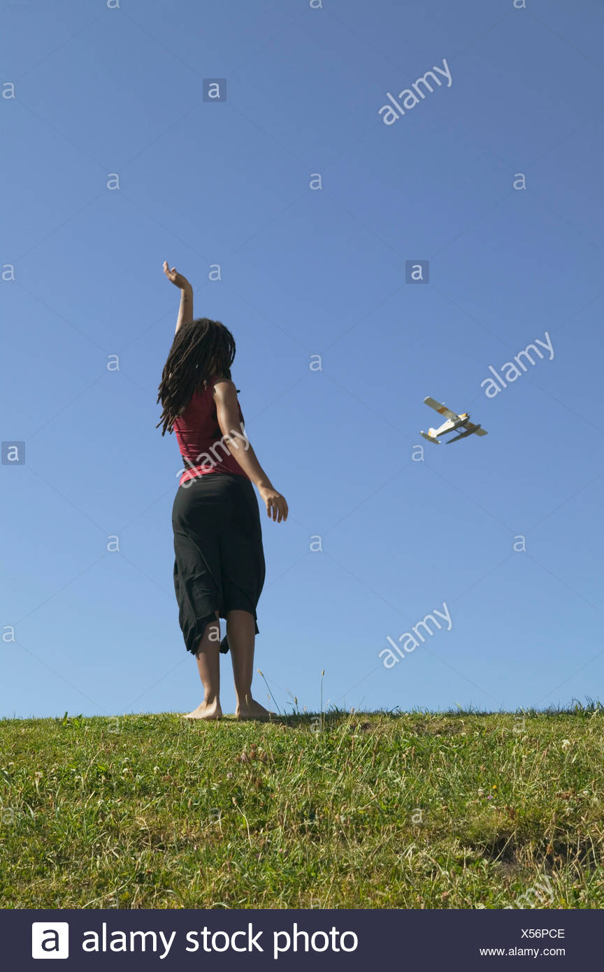Waving Goodbye Back View Stock Photos & Waving Goodbye Back View Stock ...