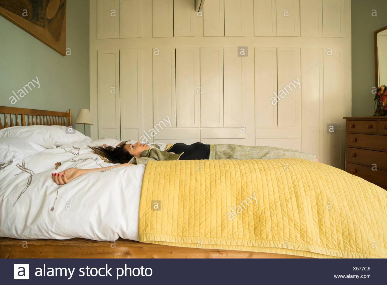 One Woman Lying Arms Out High Resolution Stock Photography and Images ...