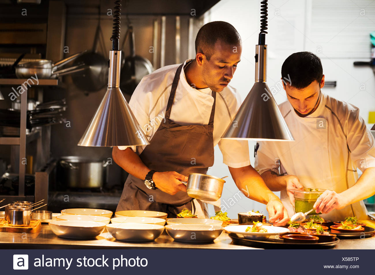 Chefs In Commercial Kitchen High Resolution Stock Photography and ...