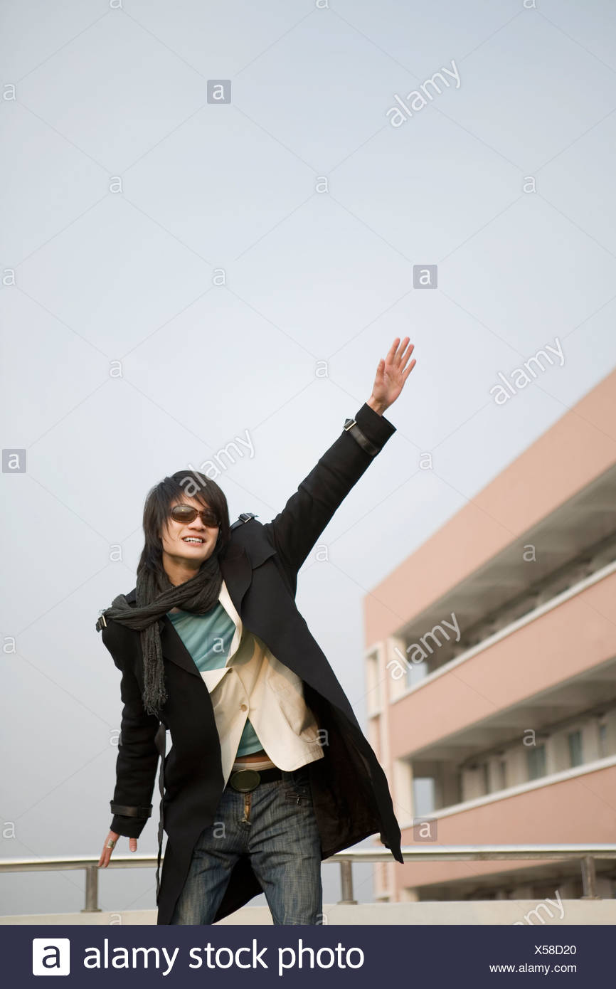 Raising Arm Stock Photos & Raising Arm Stock Images - Alamy