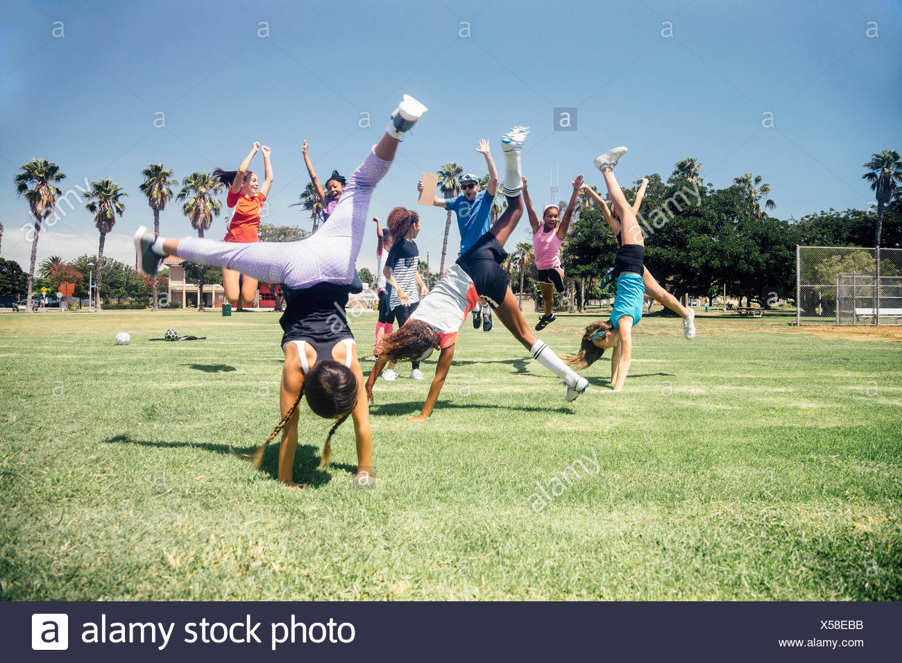 Girl Doing Cartwheel High Resolution Stock Photography and Images - Alamy