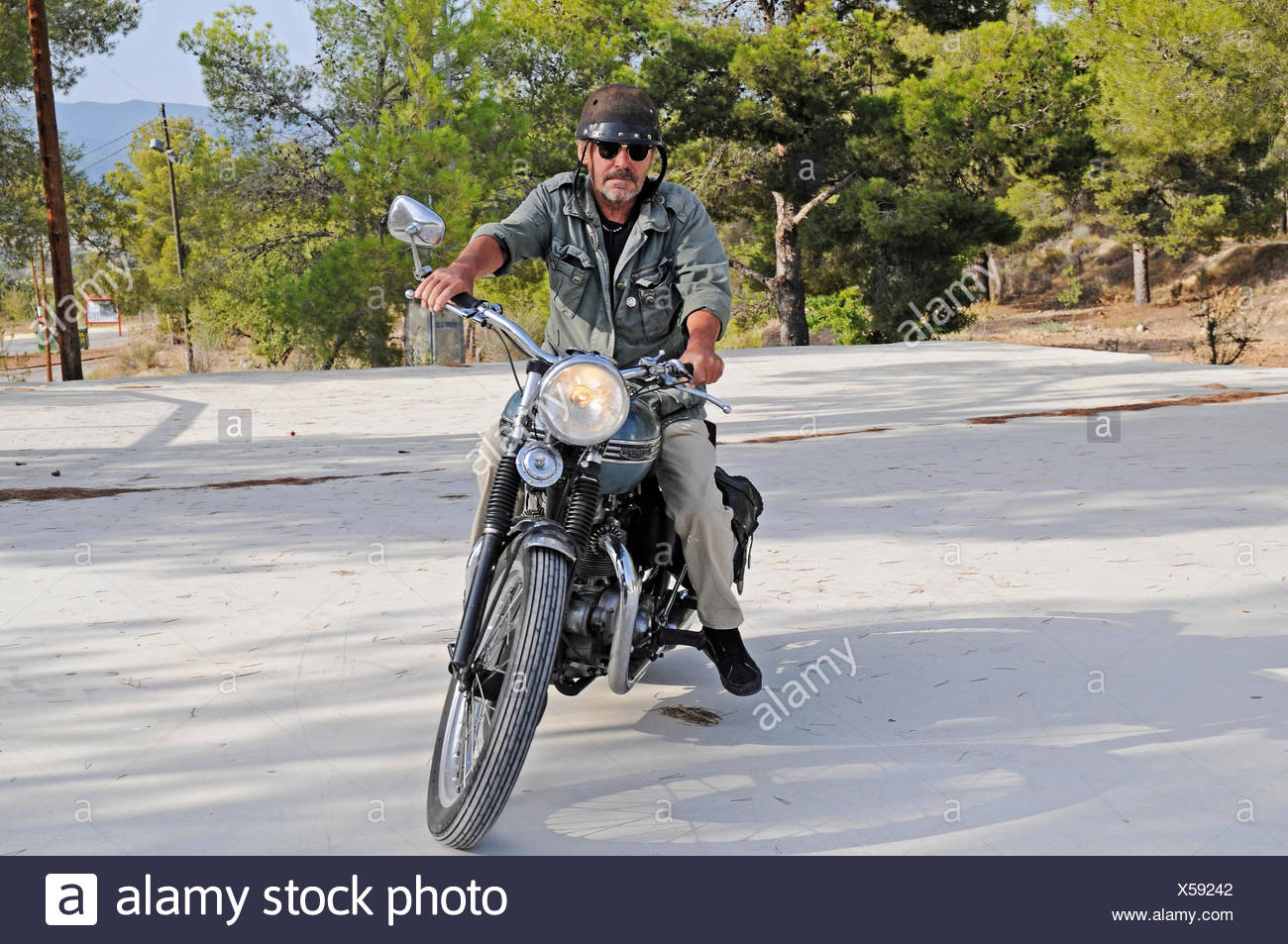 Old Man Riding Motorcycle High Resolution Stock Photography and Images ...
