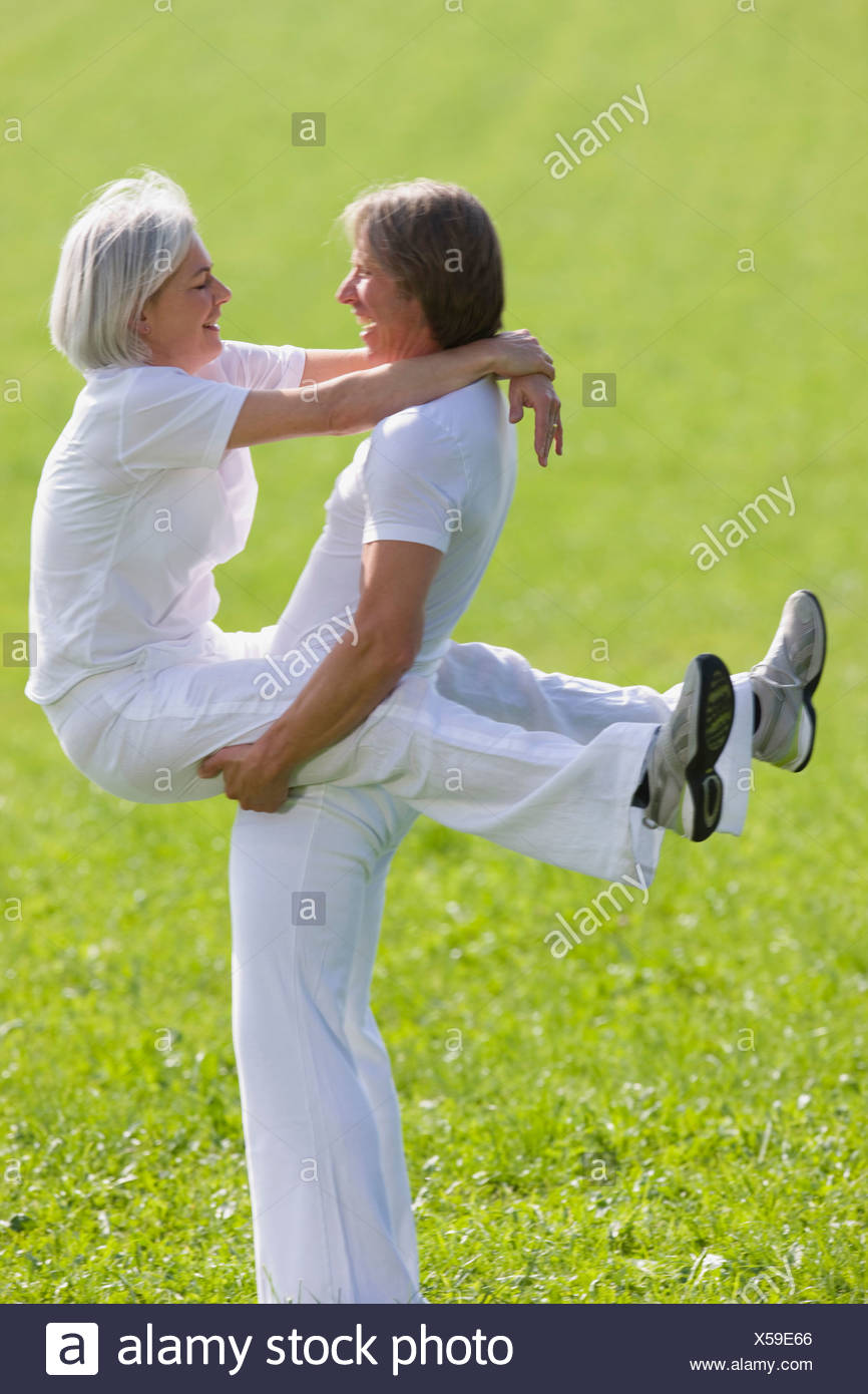 Man Lifting Woman Up High Resolution Stock Photography and Images - Alamy