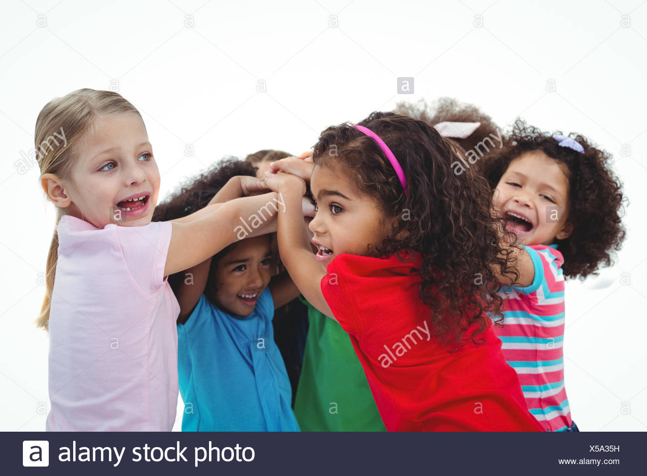 Girls Huddled Together High Resolution Stock Photography and Images - Alamy