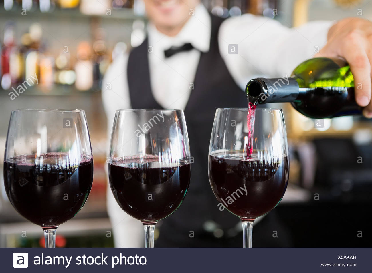Waiter Pouring Wine High Resolution Stock Photography and Images - Alamy
