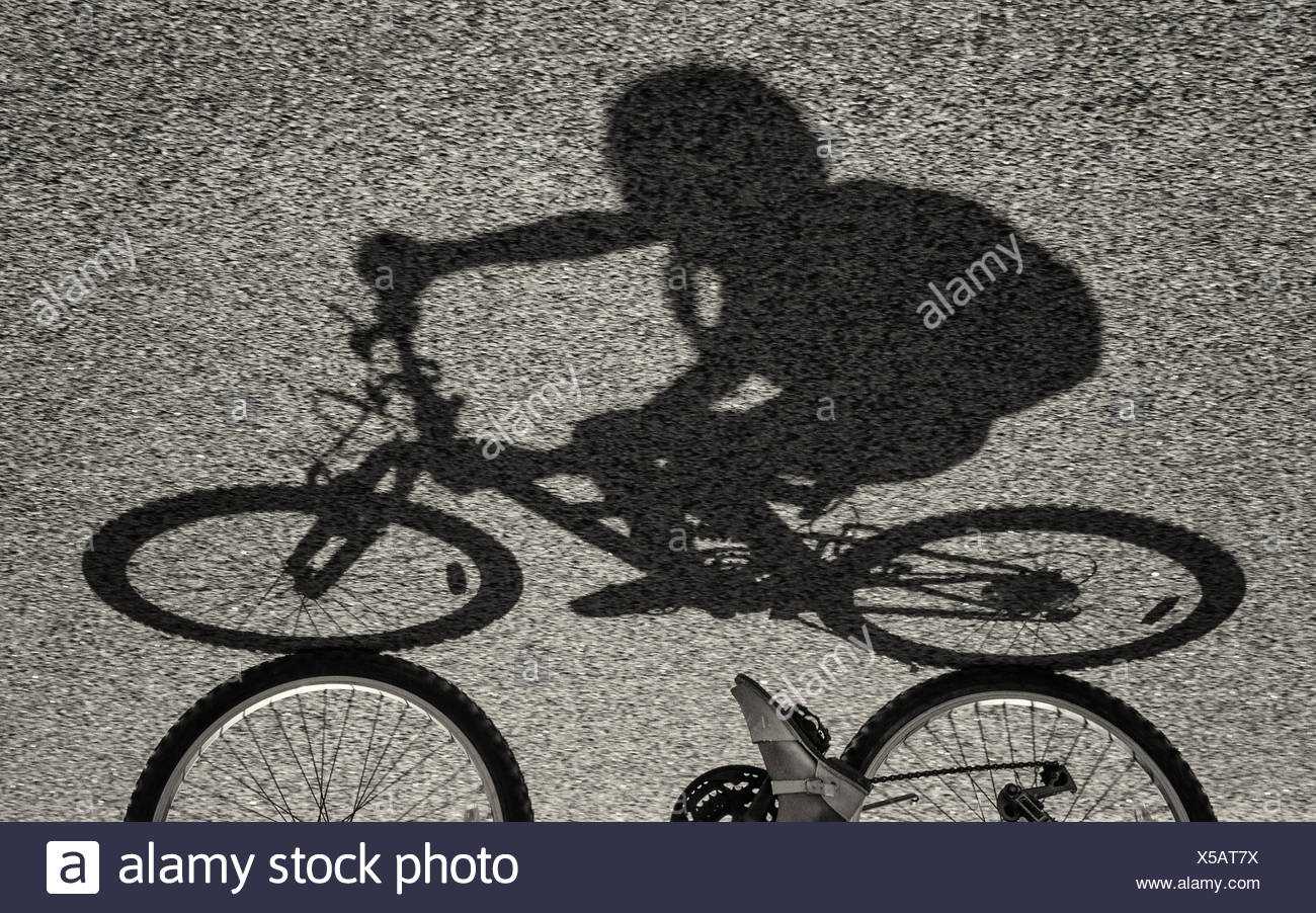 Shadow Girl Riding Bike High Resolution Stock Photography and Images ...
