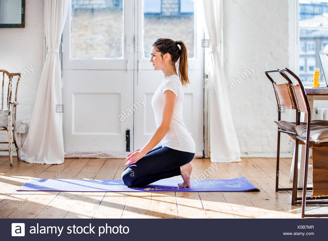 Kneeling Position High Resolution Stock Photography and Images - Alamy