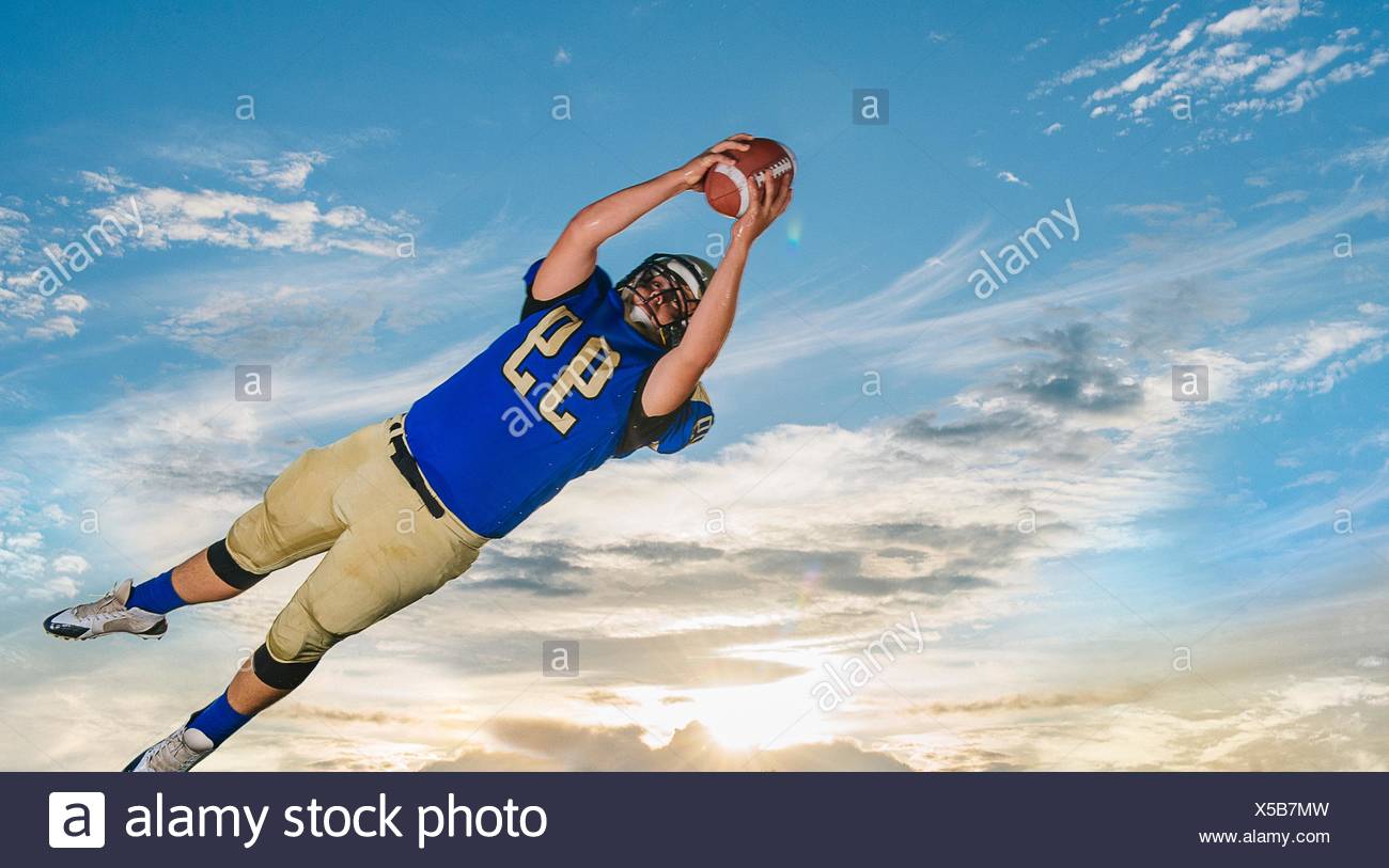 Boy Holding Football Ball High Resolution Stock Photography and Images ...