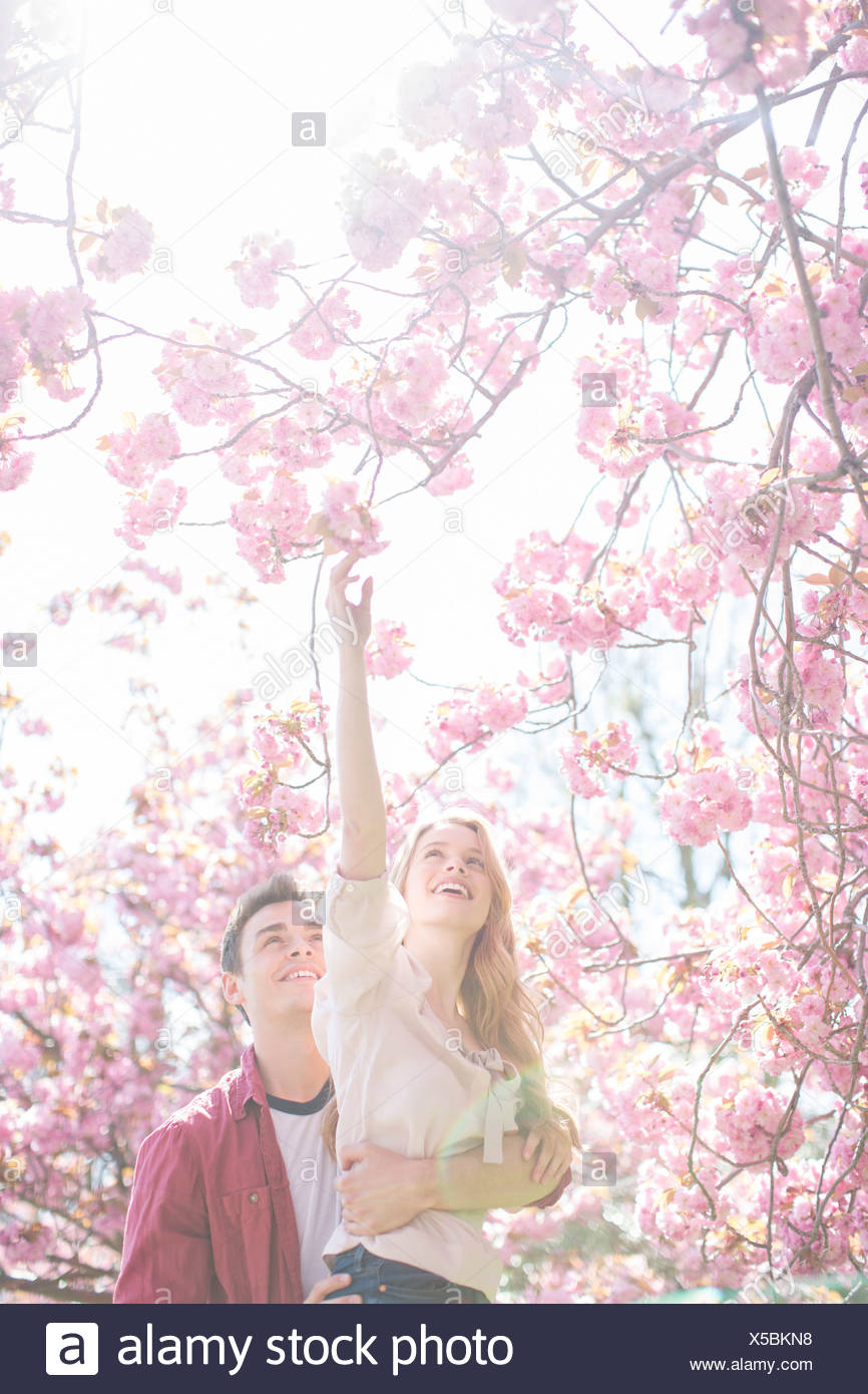 Man Lifting Up Woman High Resolution Stock Photography and Images - Alamy