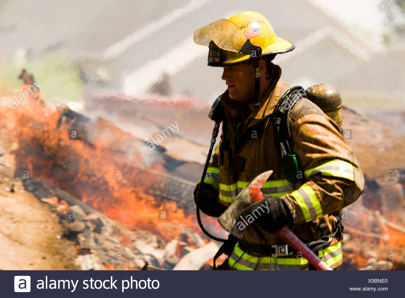 Firefighter With Axe High Resolution Stock Photography and Images - Alamy