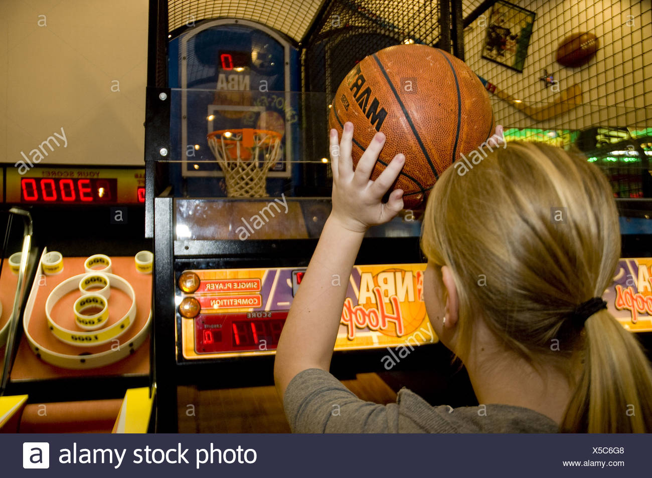 Girl Arcade Game High Resolution Stock Photography and Images - Alamy