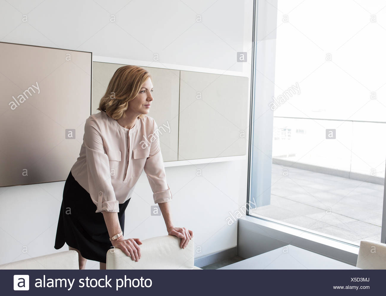 Person Looking Out Of Office Window High Resolution Stock Photography ...