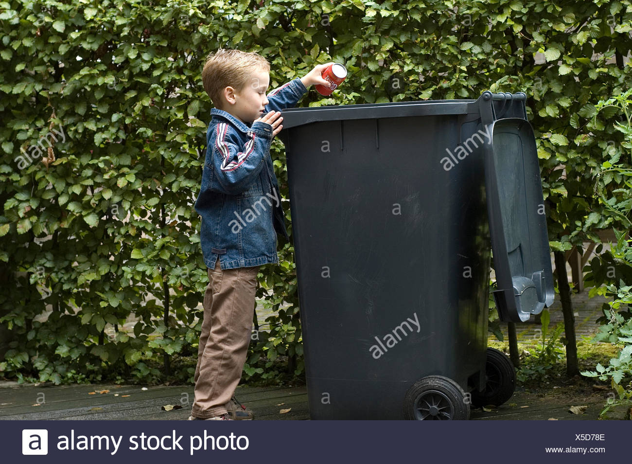 Throw Garbage Bin High Resolution Stock Photography and Images - Alamy