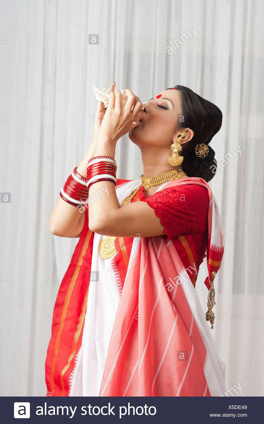 Shell Blowing High Resolution Stock Photography and Images - Alamy