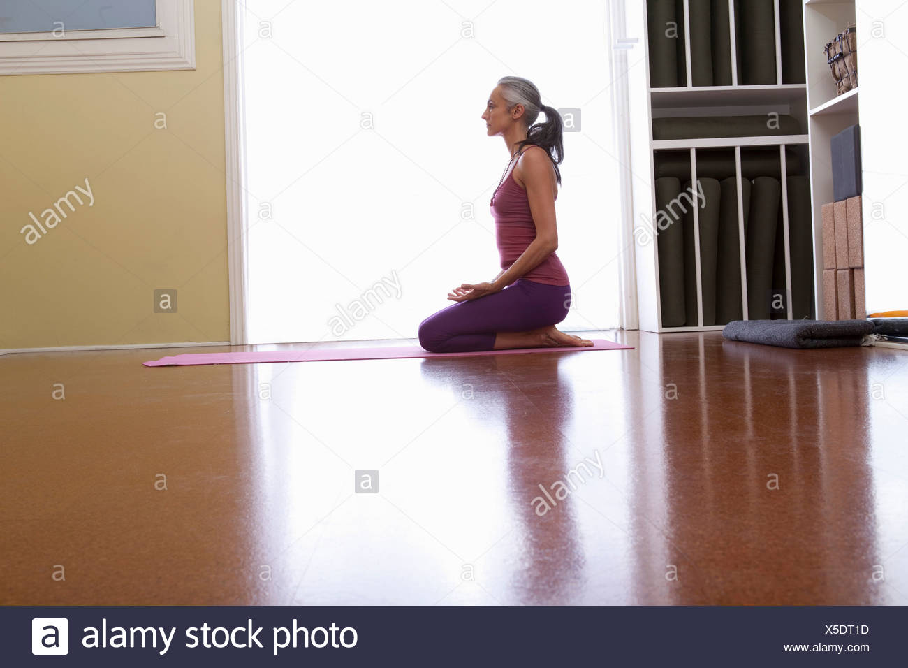 Kneeling On The Floor High Resolution Stock Photography and Images - Alamy