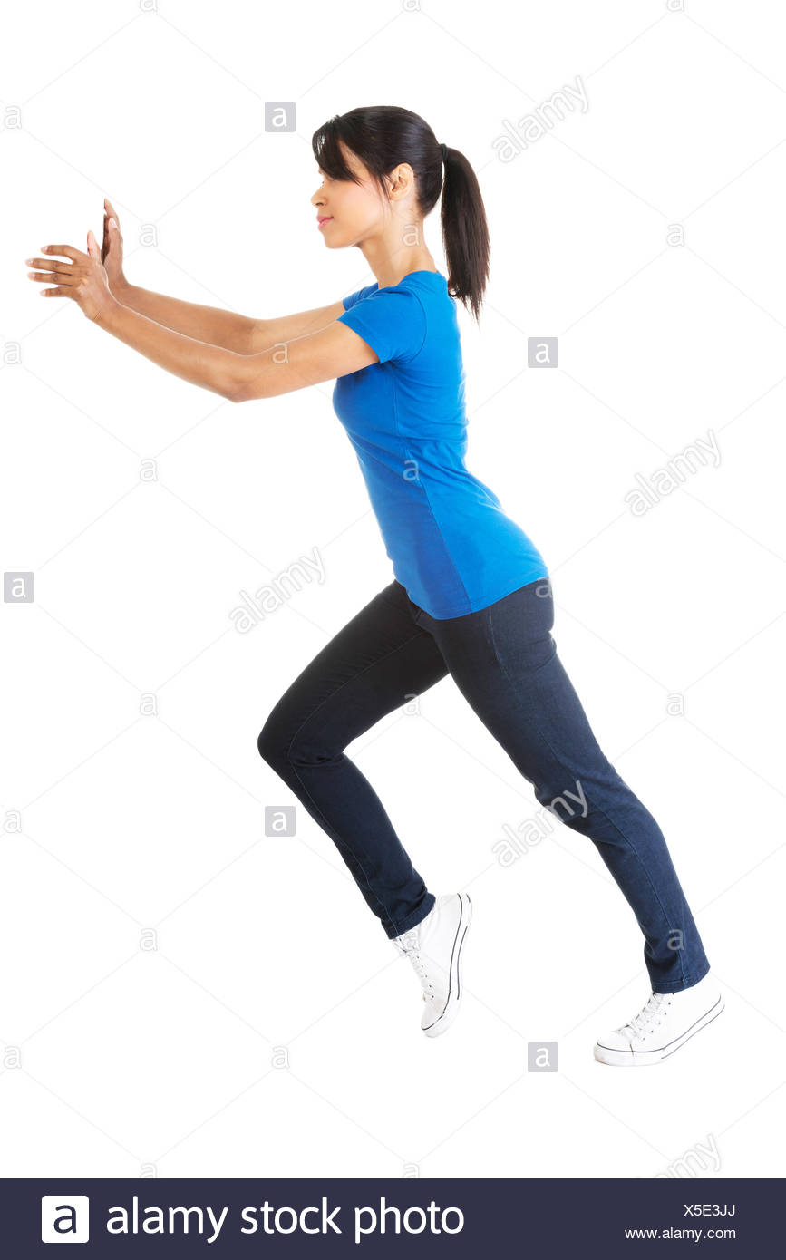 Girl Pushing Wall Stock Photos & Girl Pushing Wall Stock Images - Alamy