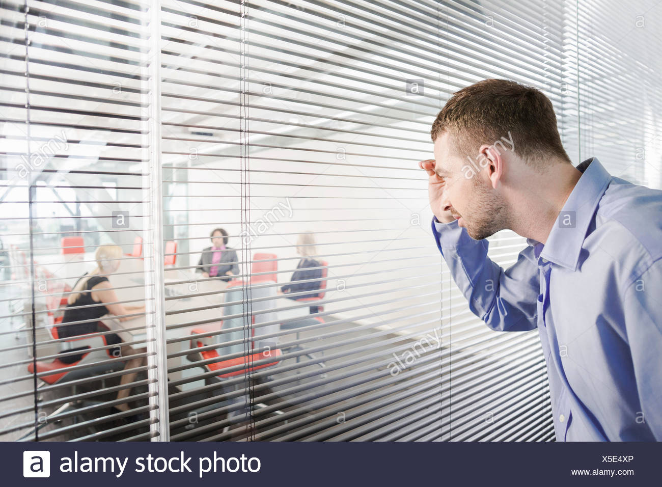 Looking Peering High Resolution Stock Photography and Images - Alamy