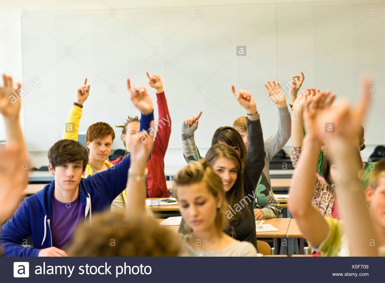 Hands Up Classroom Stock Photos & Hands Up Classroom Stock Images - Alamy
