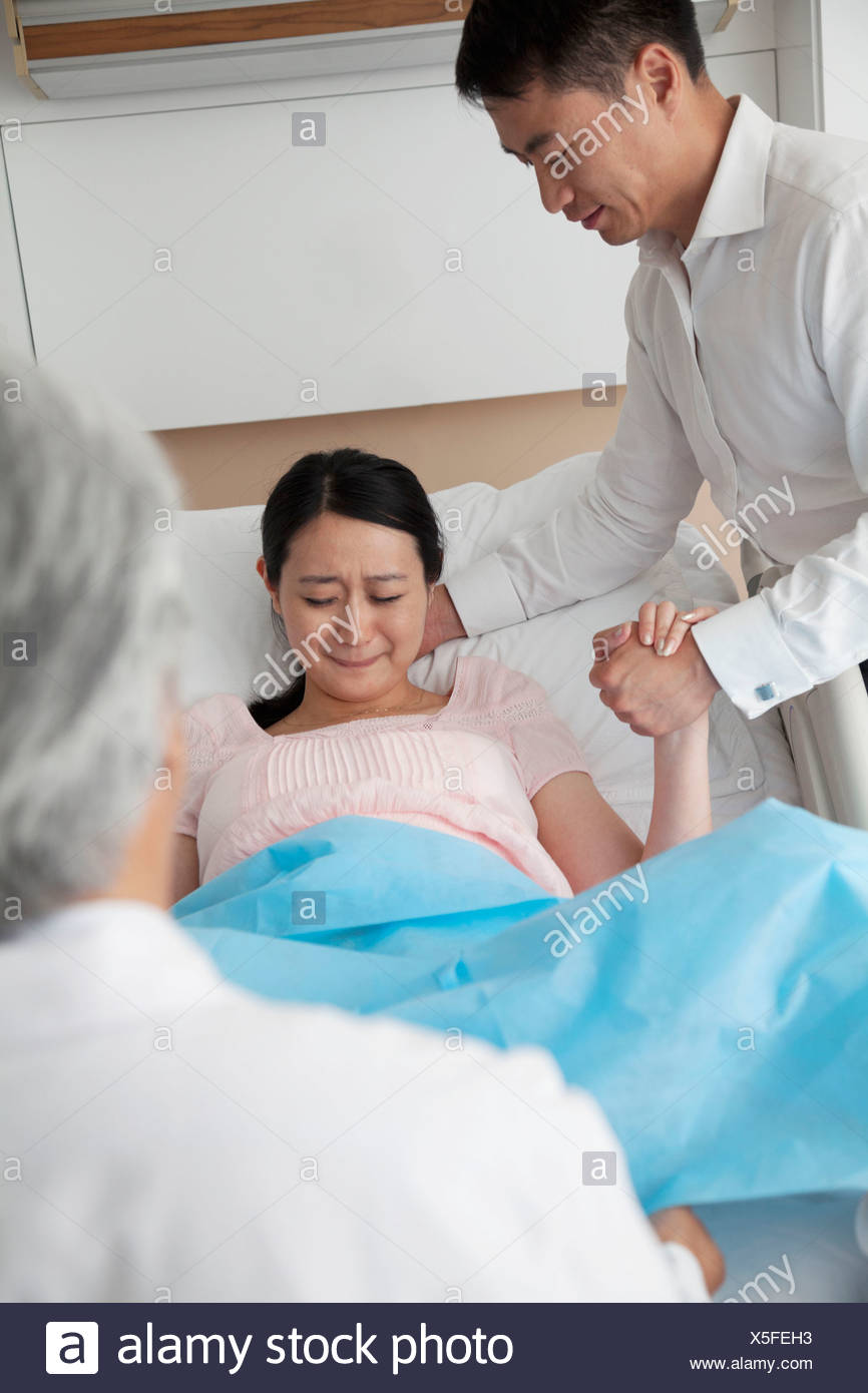 Pregnant Women With Husbands High Resolution Stock Photography and ...