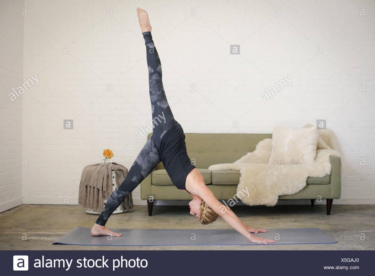 One Leg Position High Resolution Stock Photography and Images - Alamy