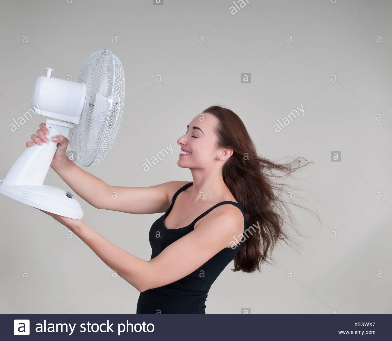 Electric Fan Woman High Resolution Stock Photography and Images - Alamy