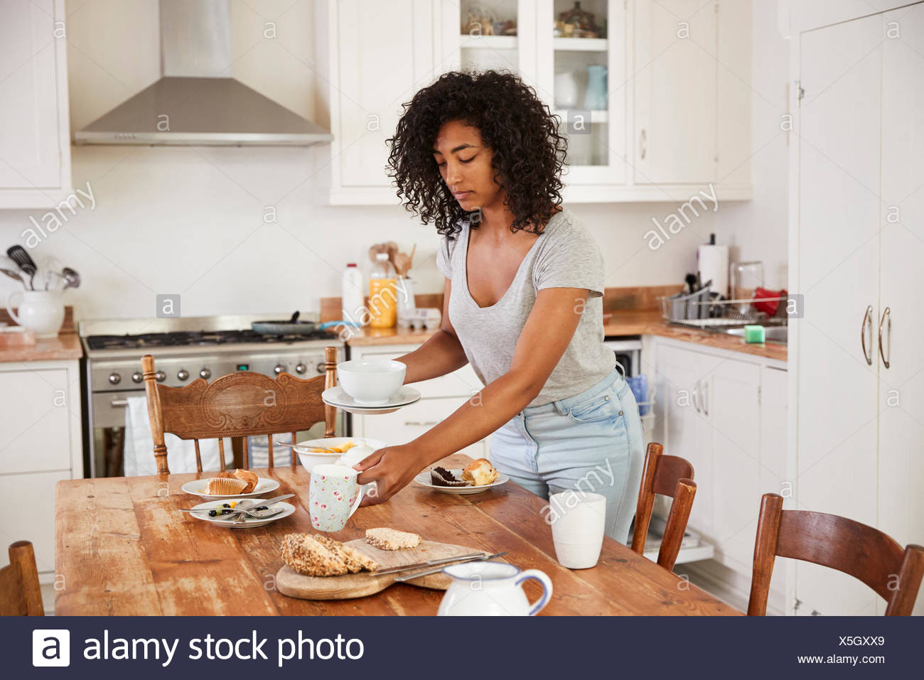 Girl Cleaning Table At Kitchen High Resolution Stock Photography and ...