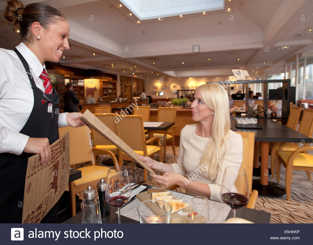 Woman Restaurant Waitress Elegant High Resolution Stock Photography and ...