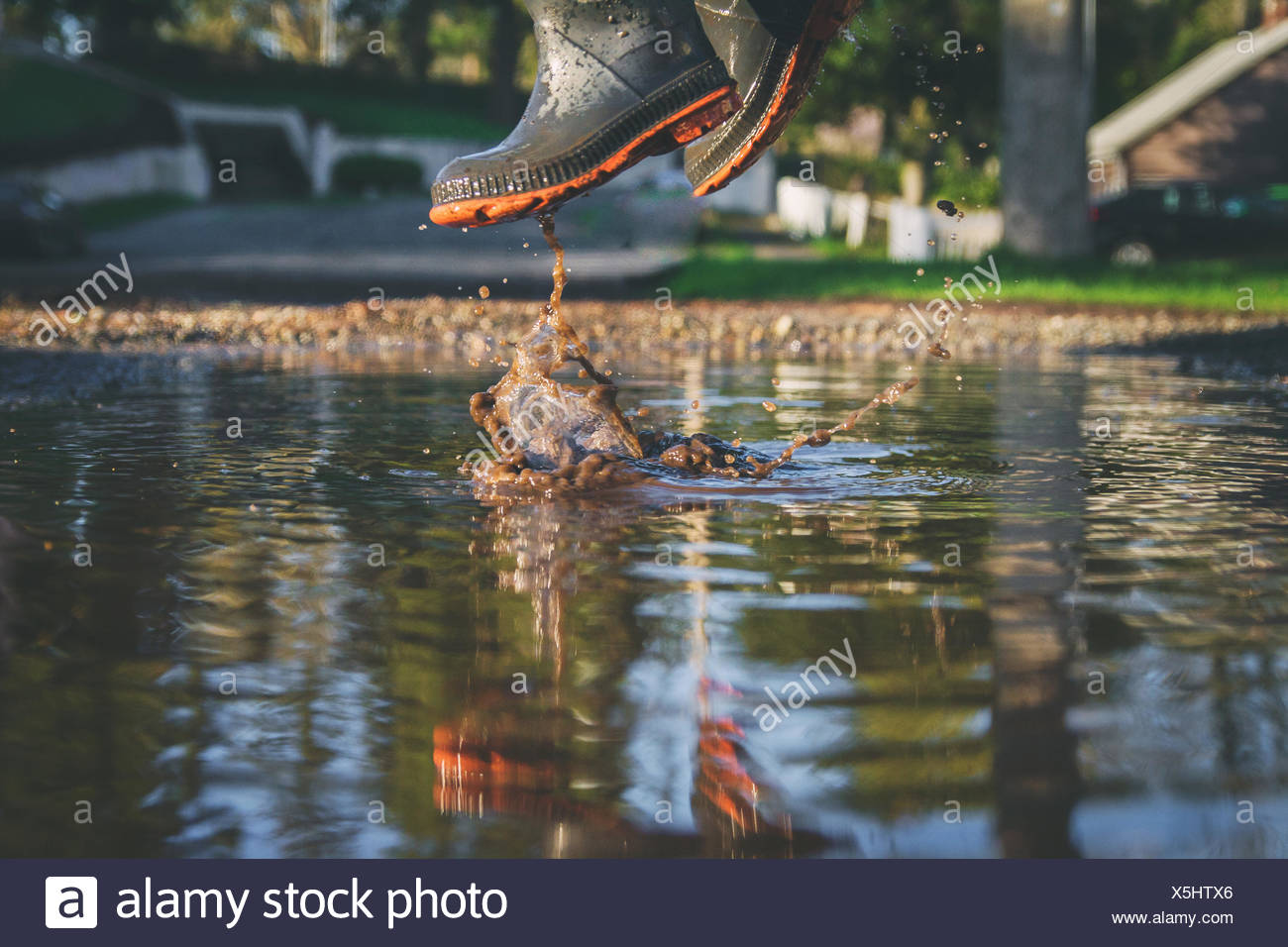 Boy In Puddle High Resolution Stock Photography and Images - Alamy