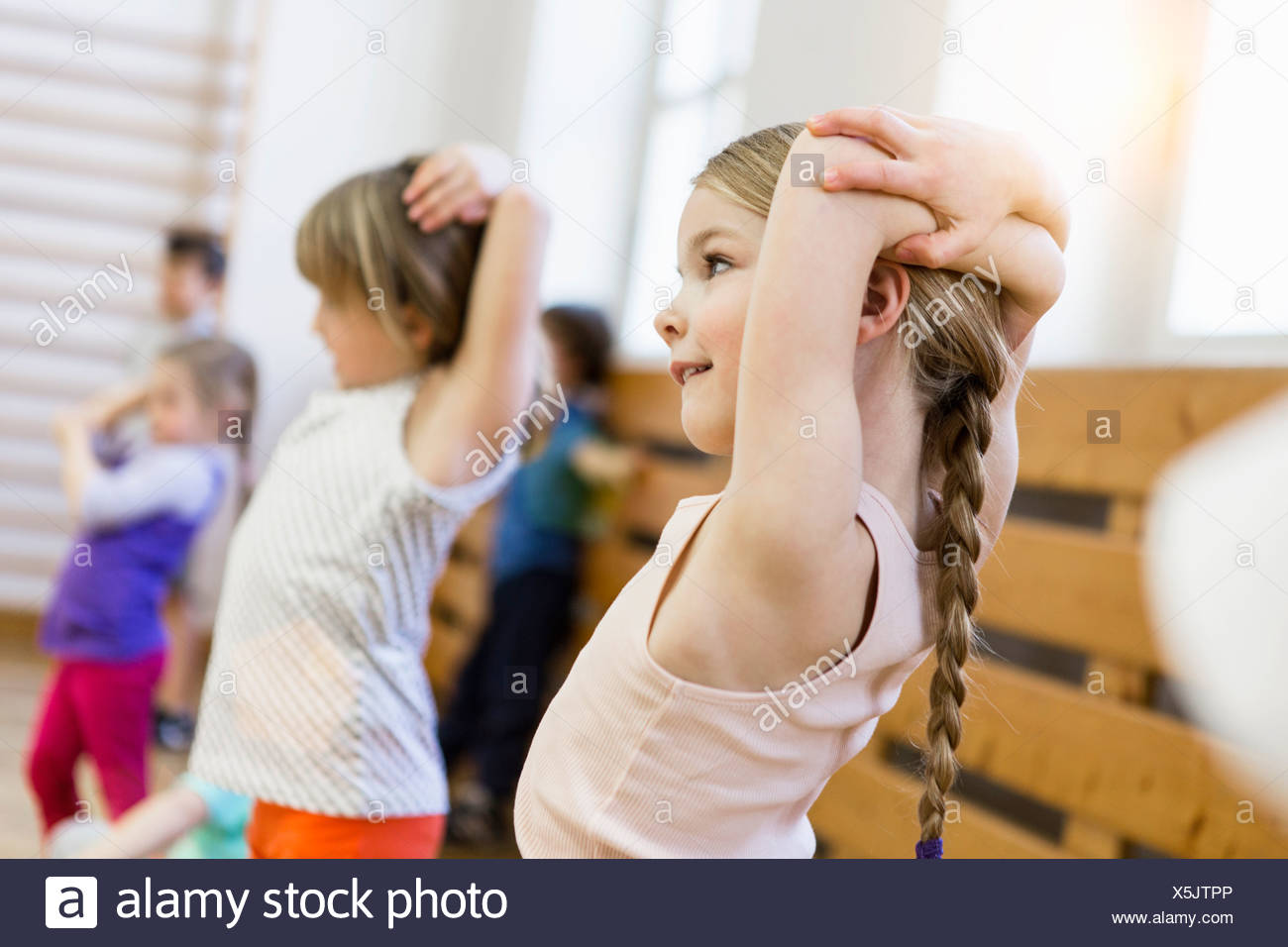 Girl Stretching Arms High Resolution Stock Photography and Images - Alamy