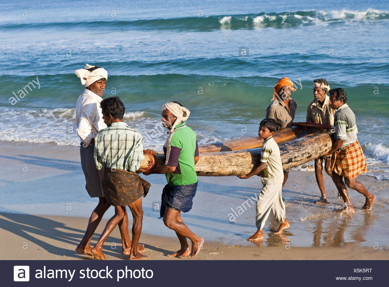 Carry Their Boat To The Water High Resolution Stock Photography and ...