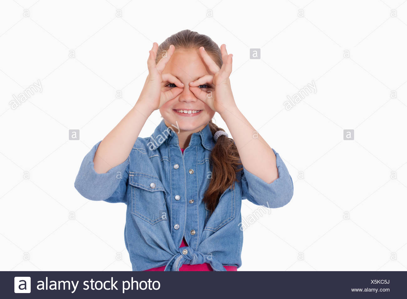 Fingers Around Eyes High Resolution Stock Photography and Images - Alamy
