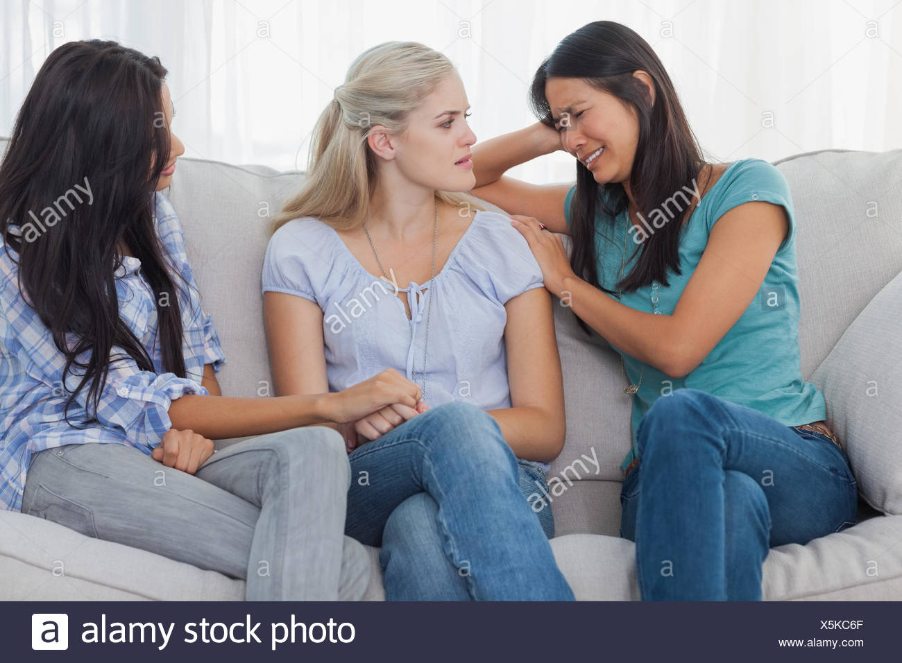 Friends Crying Stock Photos & Friends Crying Stock Images - Alamy