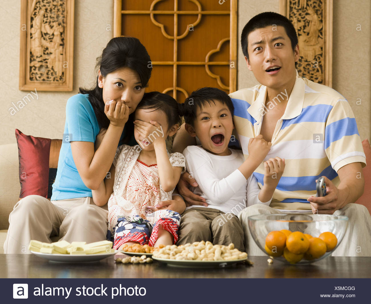 Shocked Family Watching Television High Resolution Stock Photography ...