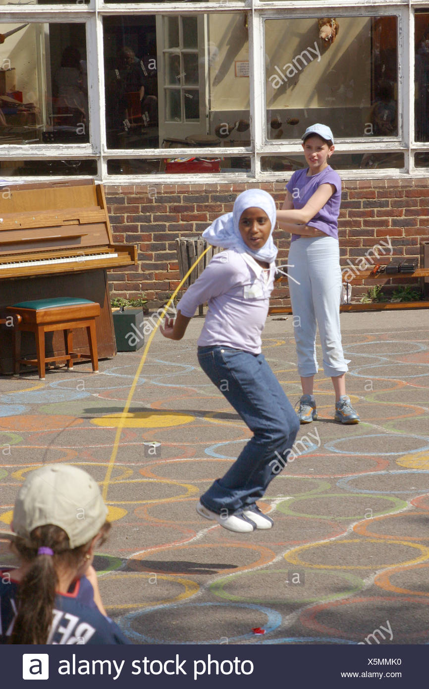School Girls Jumping Rope High Resolution Stock Photography and Images ...
