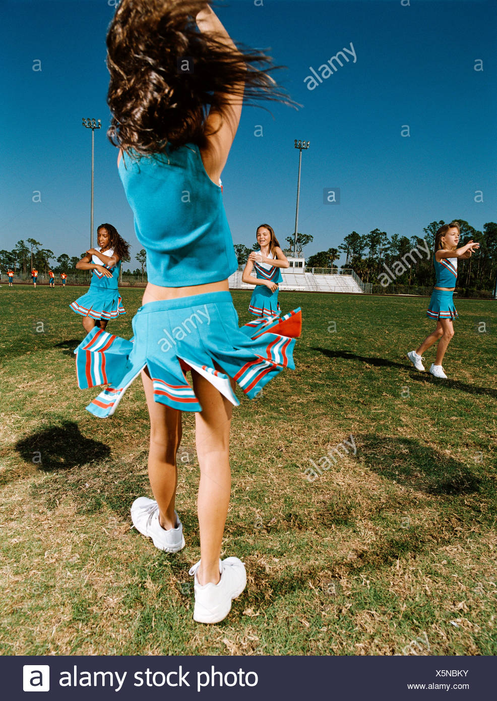 Female Middle School Cheerleader High Resolution Stock Photography and ...