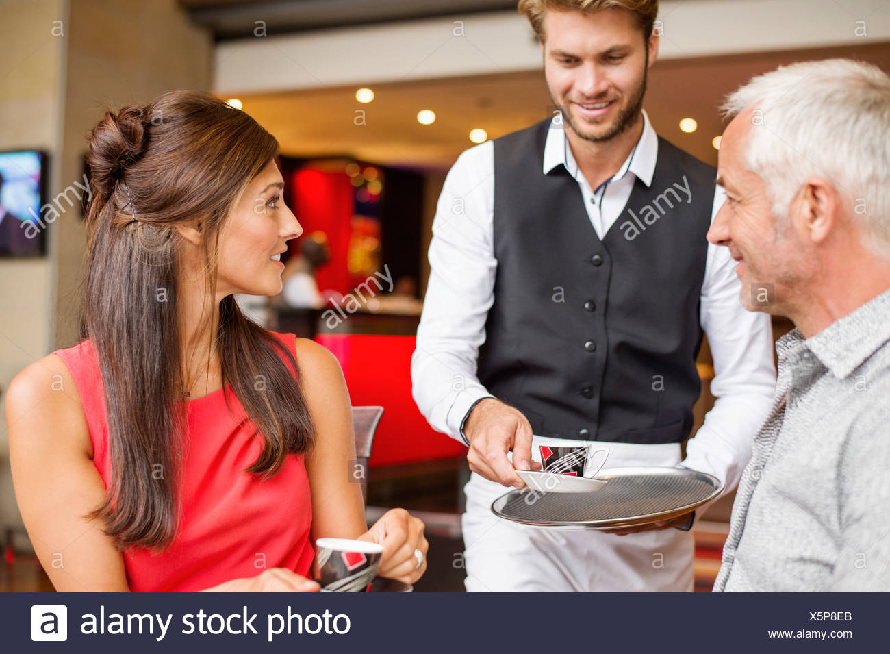 Male Waiter Serving Food High Resolution Stock Photography and Images ...