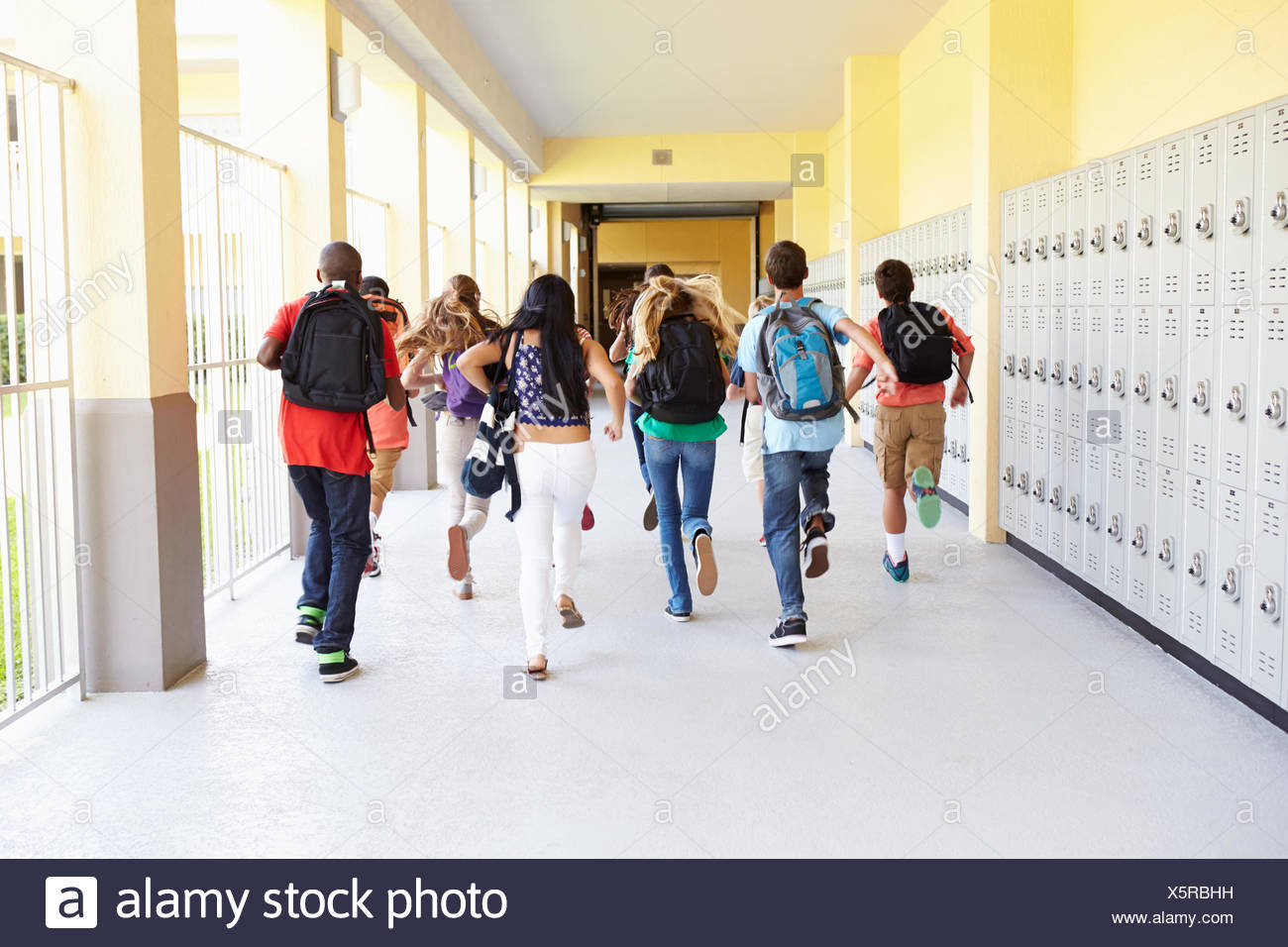 Students Running Out School High Resolution Stock Photography and ...