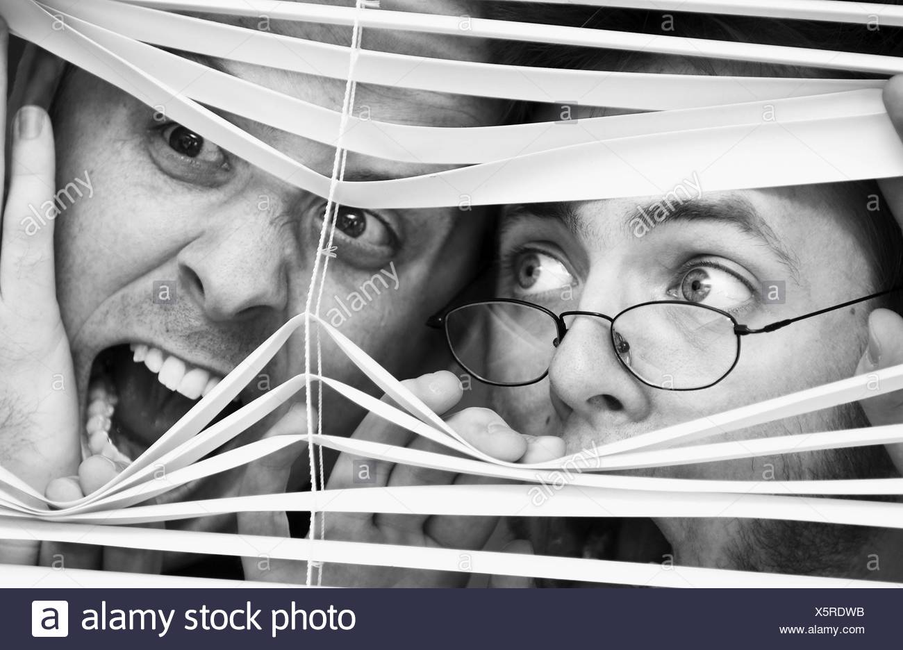 Spying Humor High Resolution Stock Photography and Images - Alamy