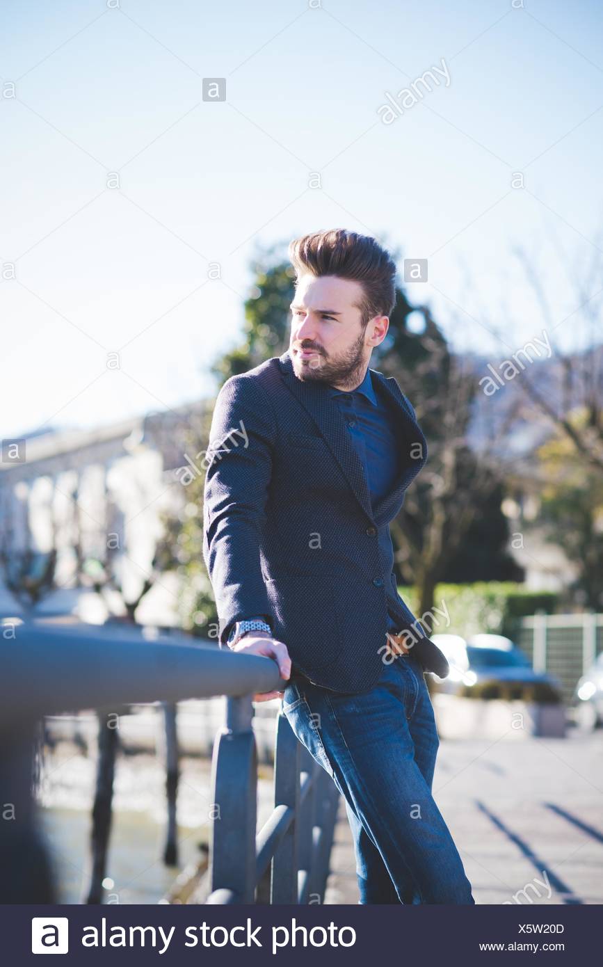 Man Leaning Over Railing High Resolution Stock Photography and Images ...