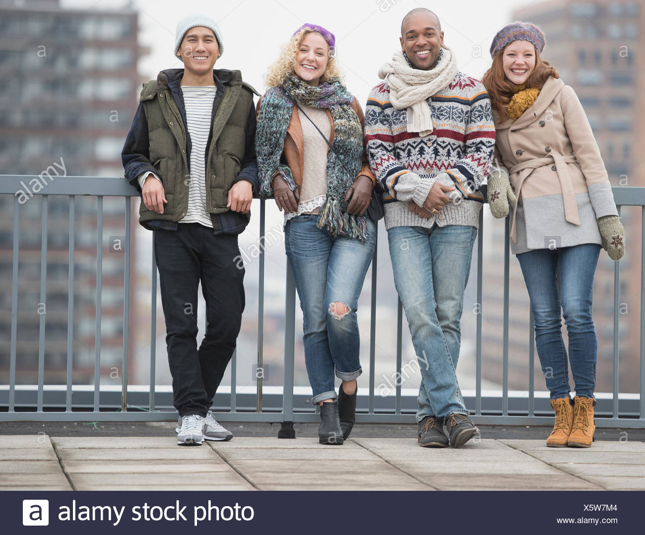 Leaning Against The Railing High Resolution Stock Photography and ...